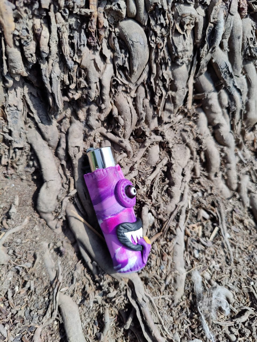 Purple Cyclops Clay Clipper Lighter